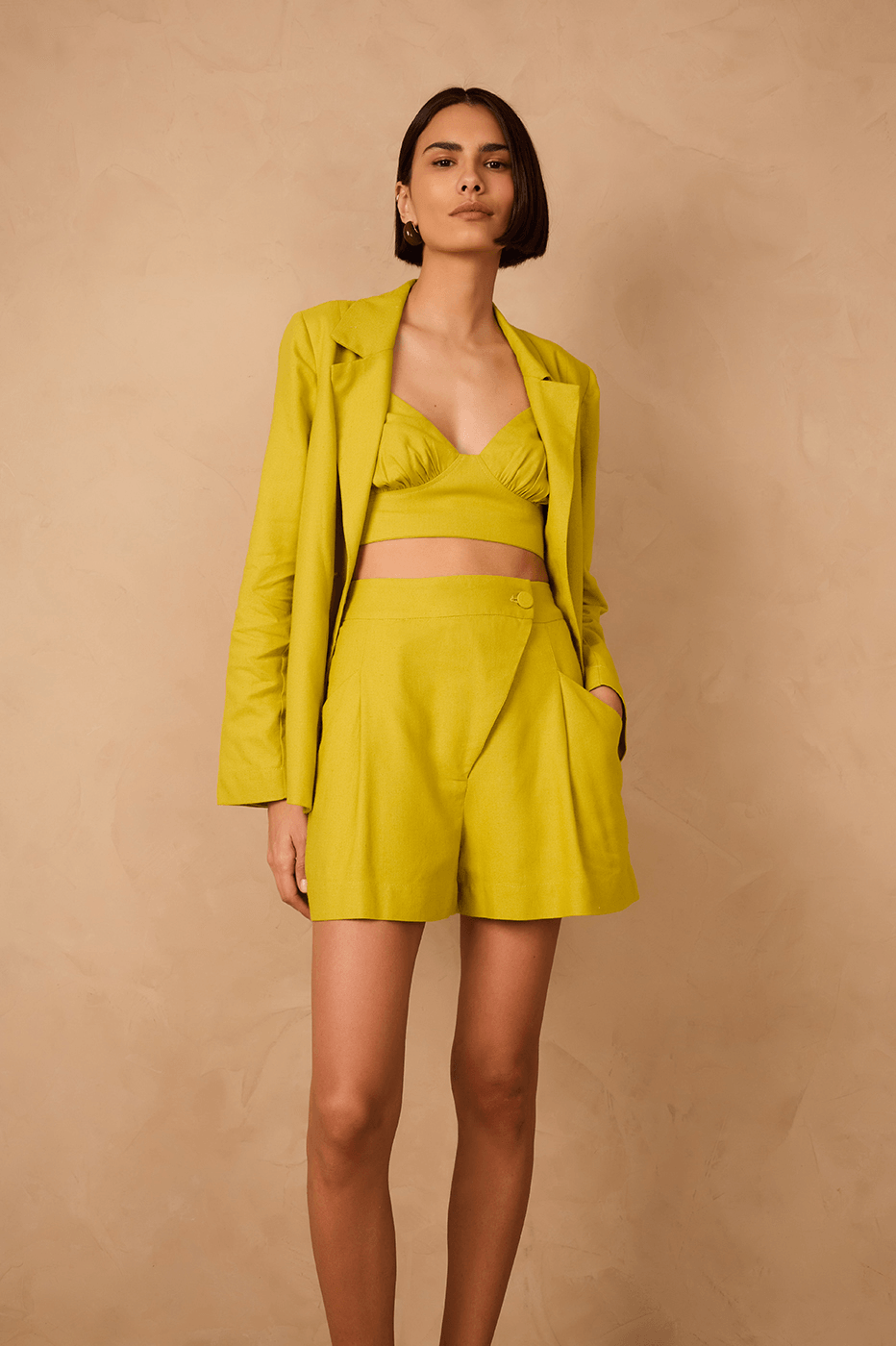 Green Urca Asymmetric Side Pockets Linen Shorts in Urca Green | Dress To